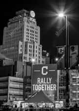 The Big Rally Together Banner behind Left Field black and white Photography
