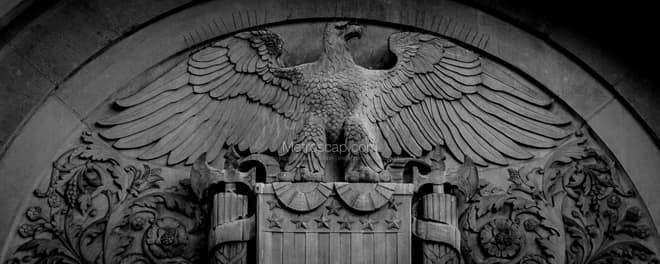 A Bald Eagle and US Shield Relief on an old Baltimore Building black ...