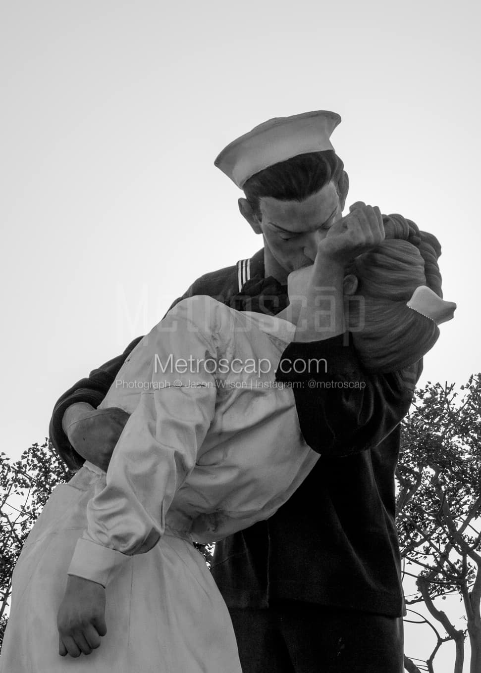 The Kissing Sailor Sculpture Near the USS Midway black and white ...